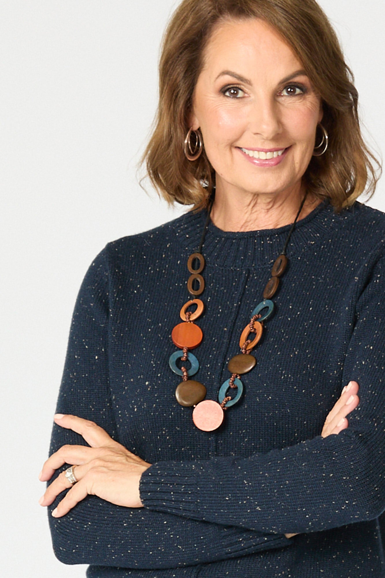 Shop Bateman Curve Hem Sweater in Navy/Camel – Fella Hamilton